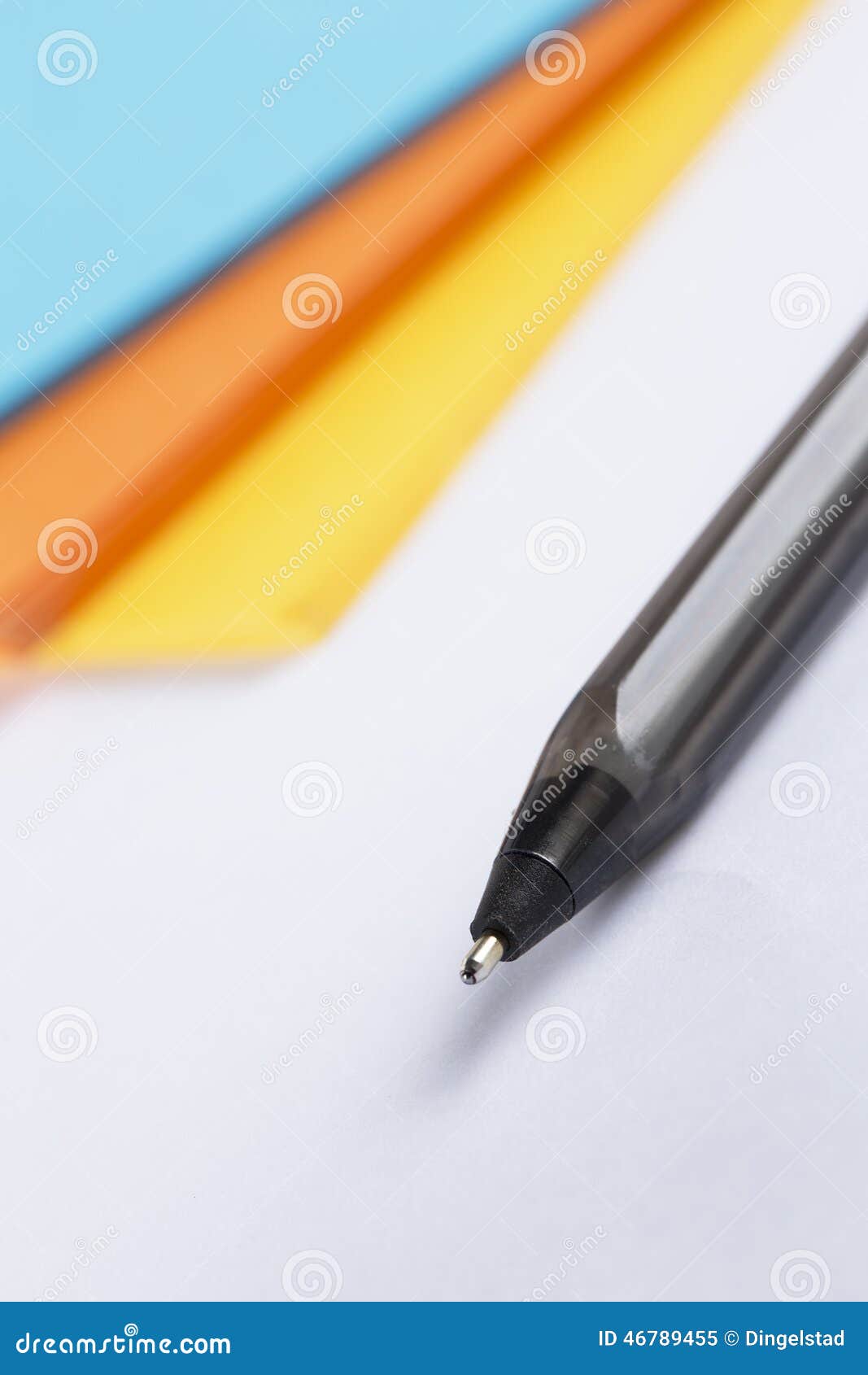 Stacks of Coloured Paper on a White Table Stock Image - Image of ...
