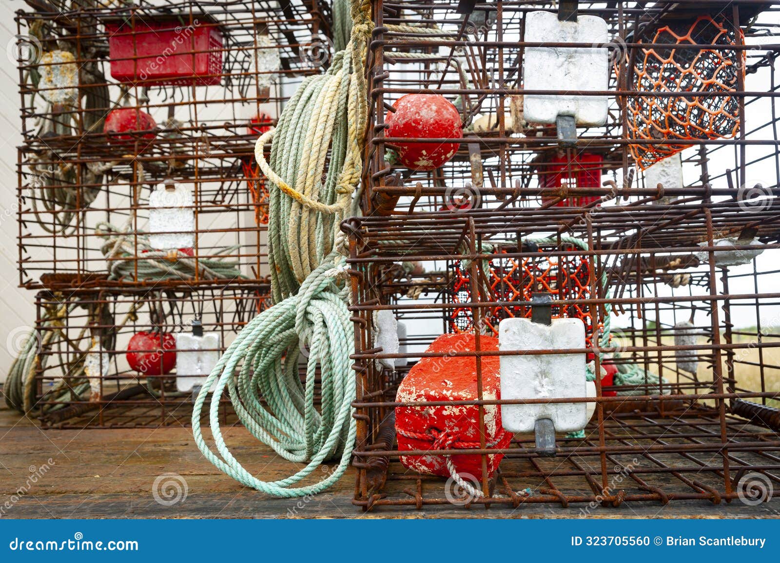 Stacks of crayfish traps stock photo. Image of town - 323705560