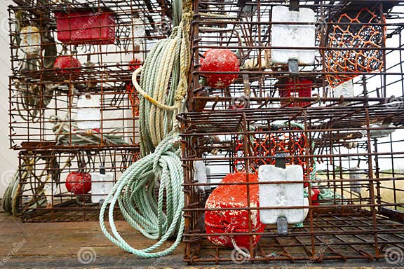 Stacks of crayfish traps stock photo. Image of town - 323705560