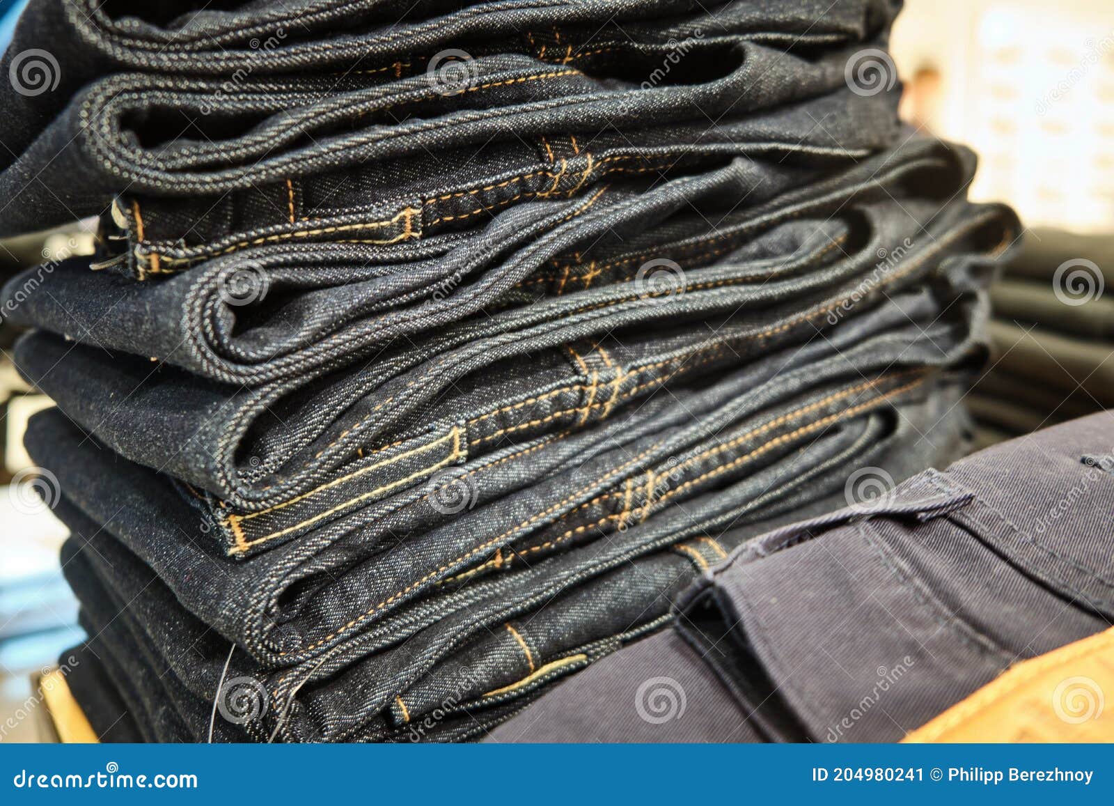 Stacks of Denim Pants Hang on Retail Store Shelf Stock Image - Image of ...