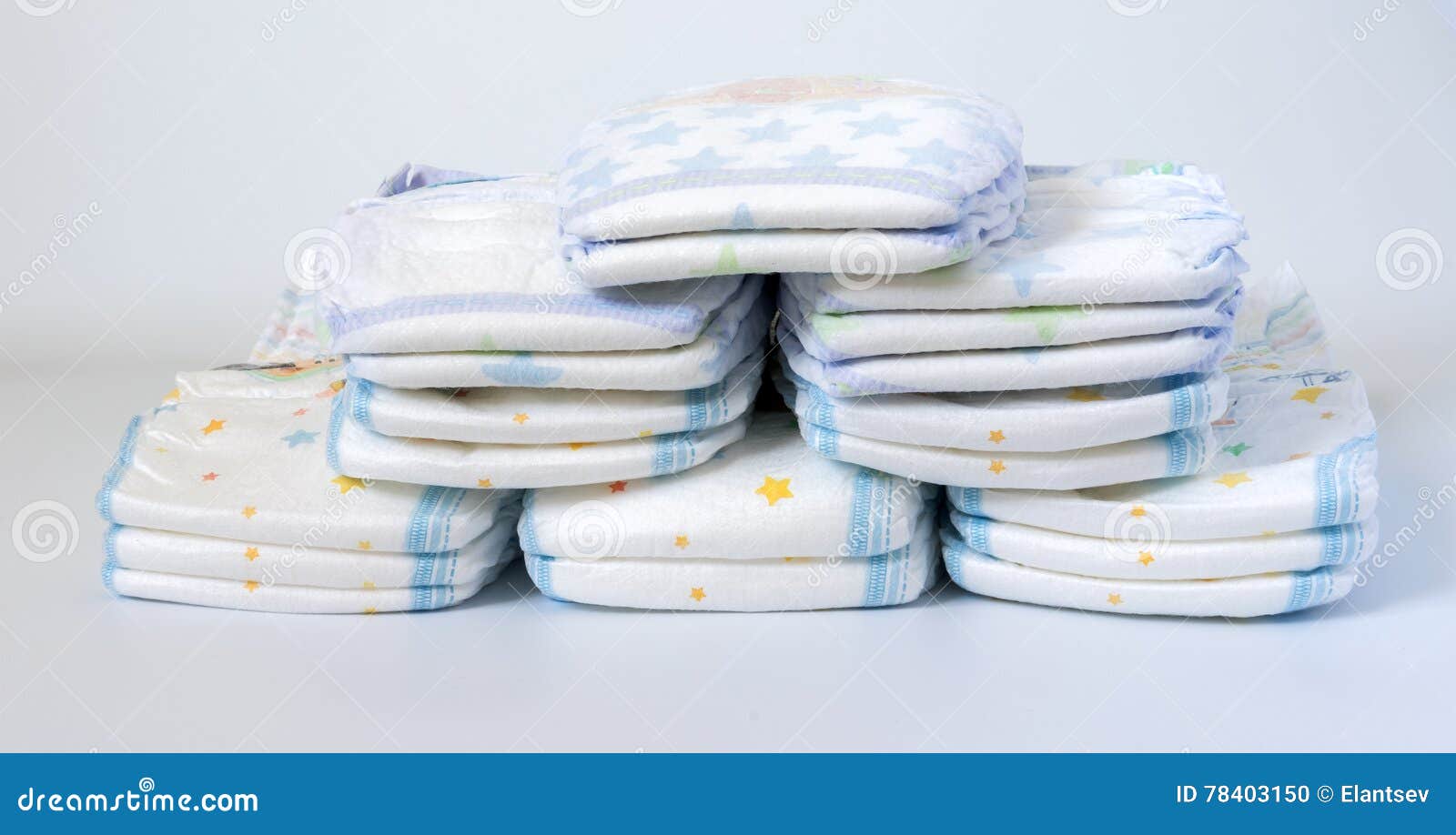 Stacks of Diapers Stacked in Staggered Rows on a White Background Stock ...