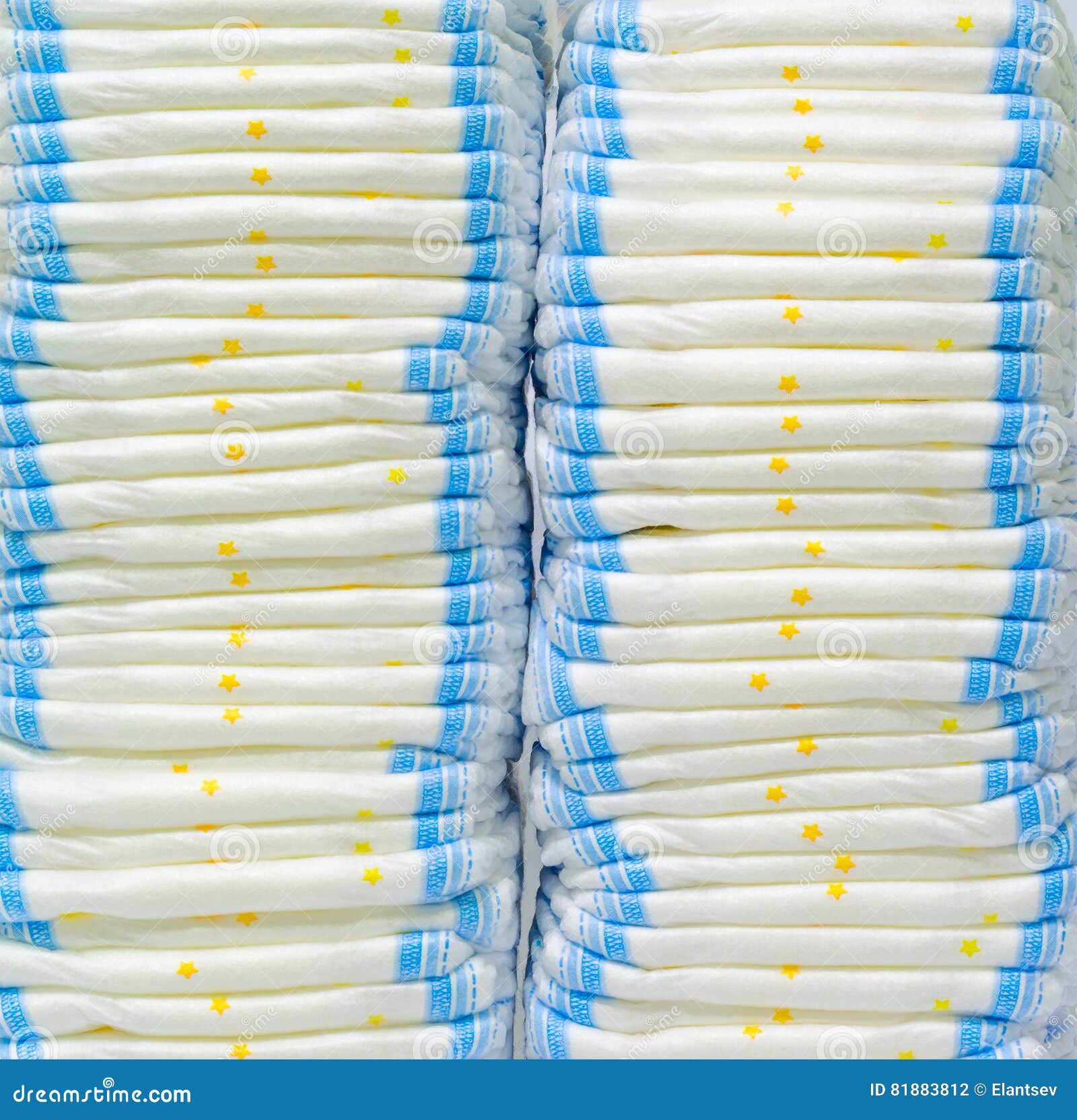 Stacks Of Diapers Stacked In Staggered Rows On A White Background ...