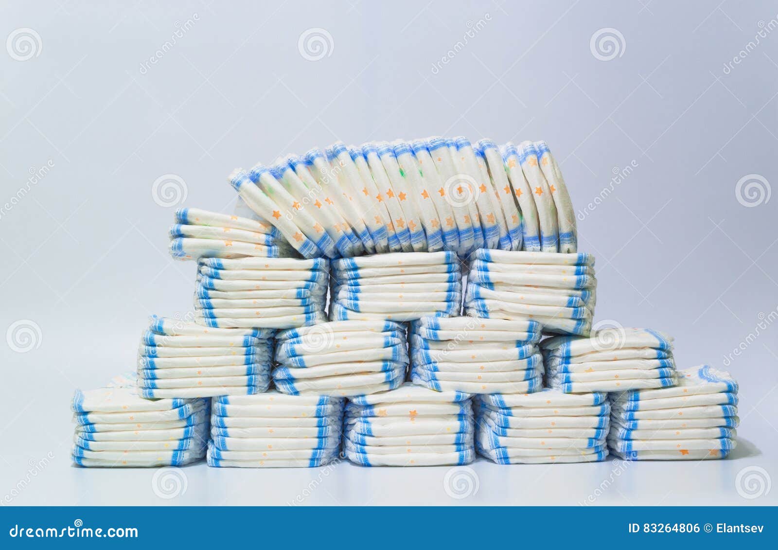 Stacks Of Diapers Stacked In Staggered Rows On A White Background ...