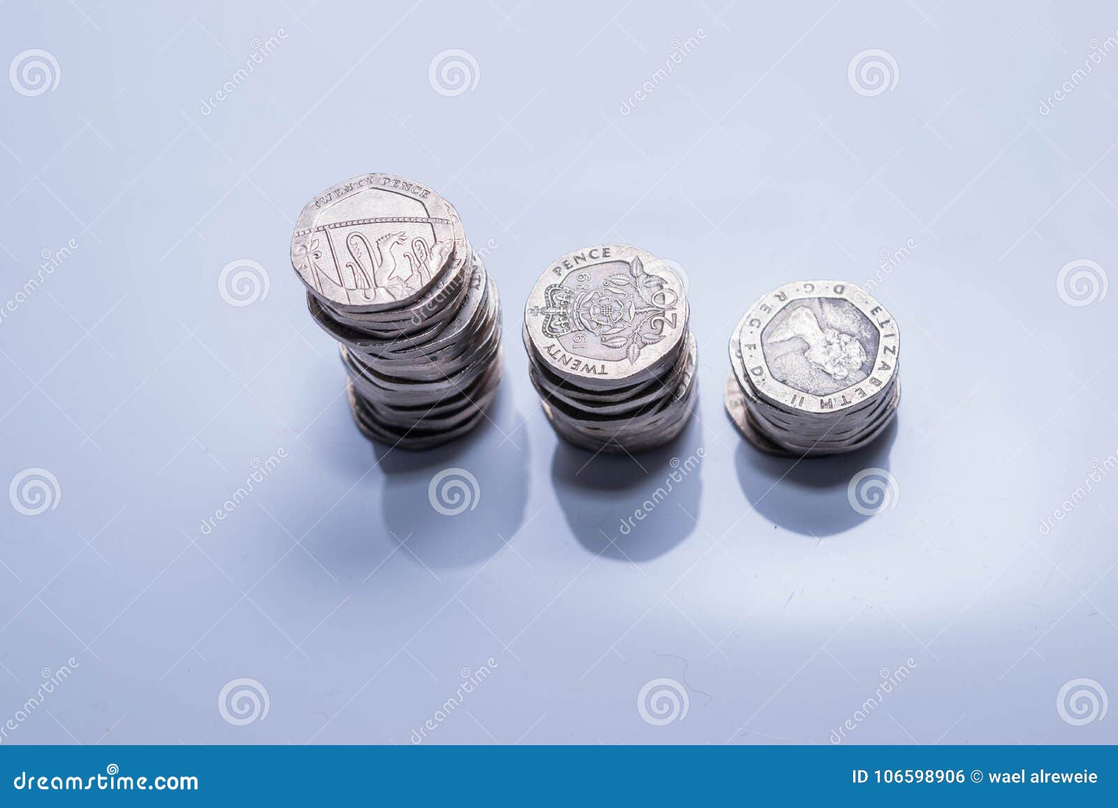 Stacks of Different British Coins on a White Background. Editorial ...