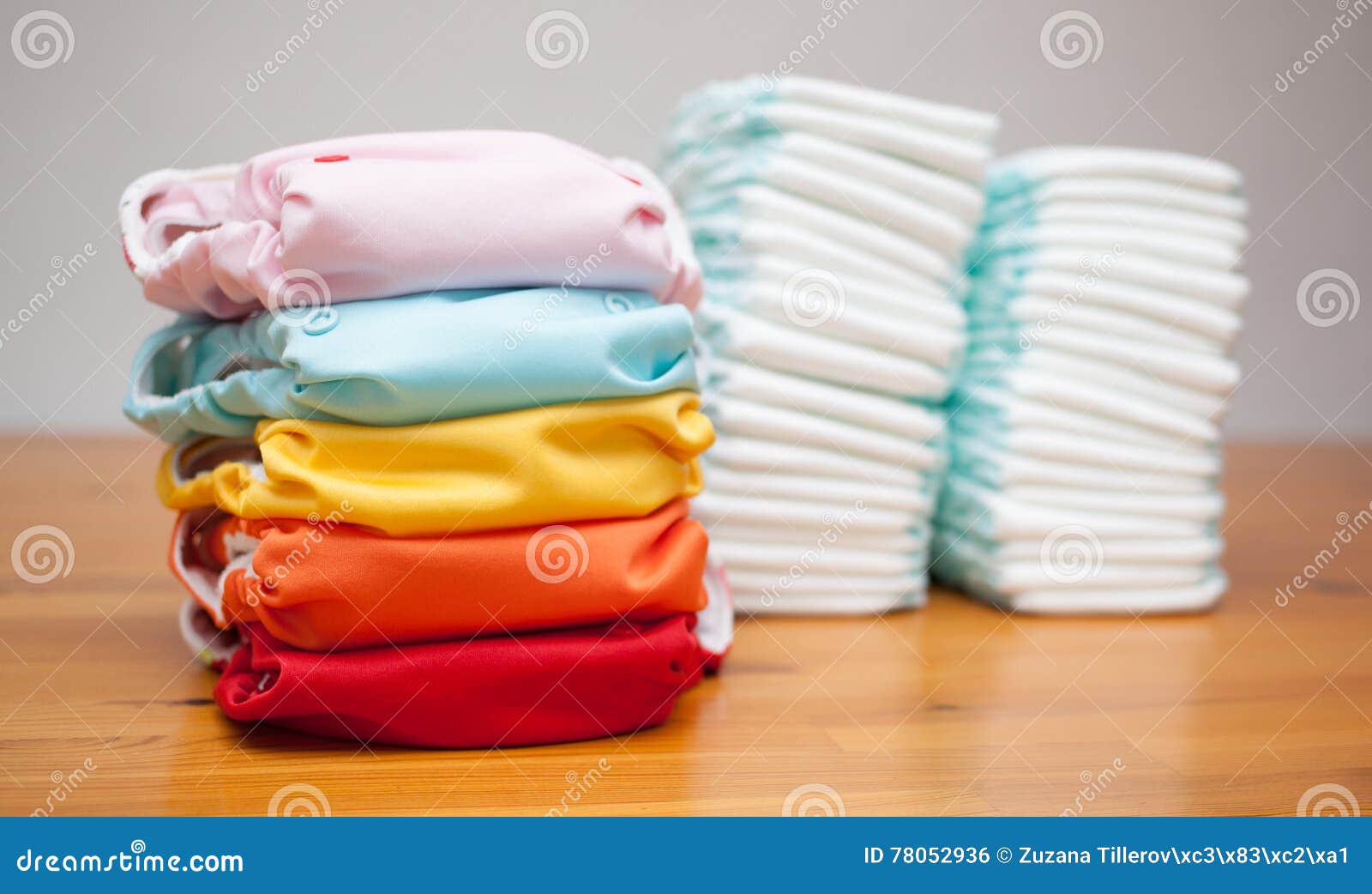 Stacks of Disposable Diapers and Modern Cloth Diapers Stock Photo ...