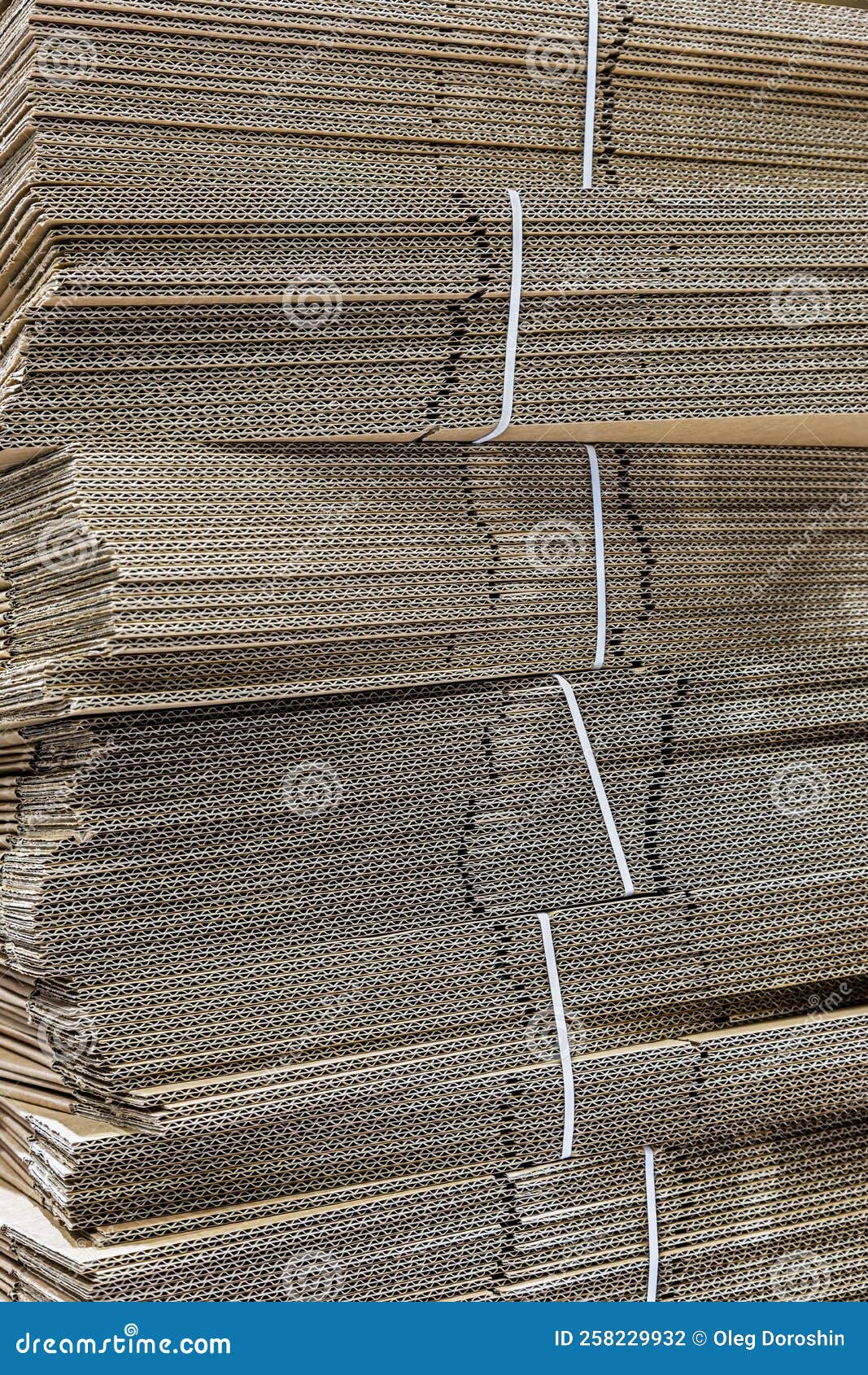 Folded Cardboard Boxes In The Warehouse. Stack Of Flat Industrial ...