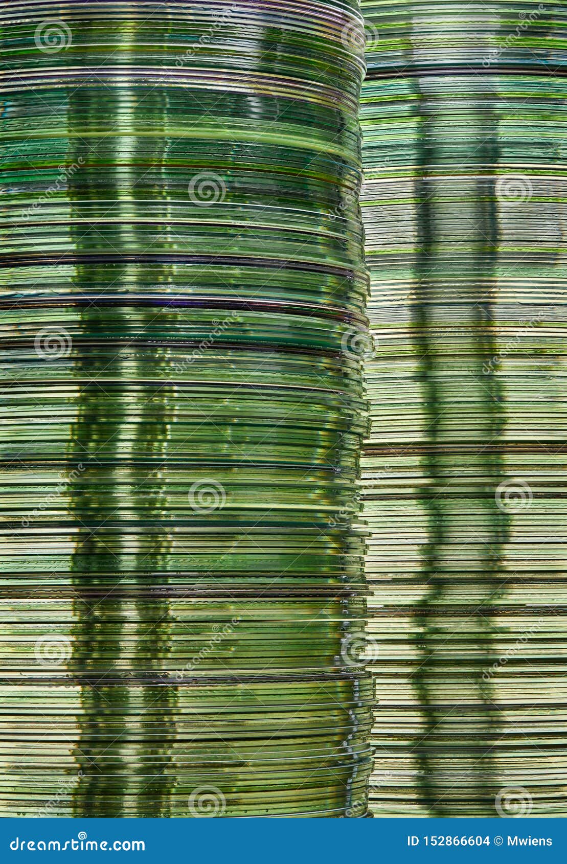 Data Storage Image with Stacks of Green Gold Translucent DVD and CD ...