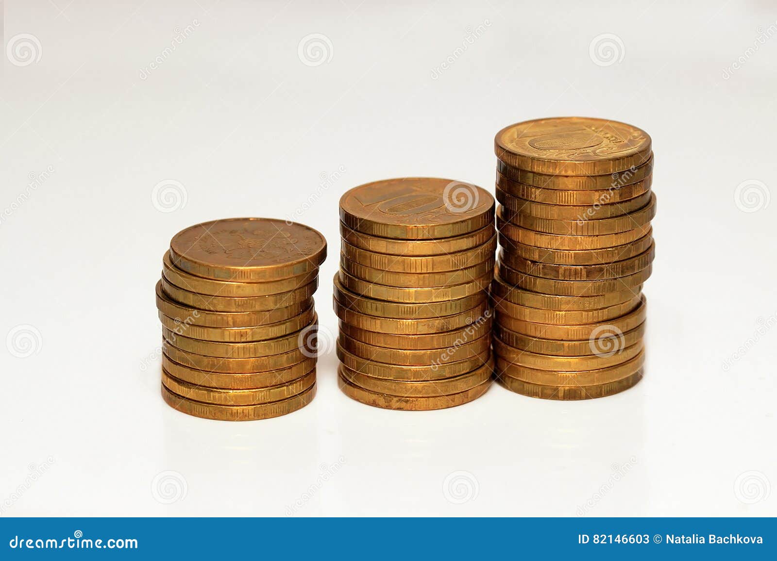 Stacks Of Copper Coins In A Row Isolated On White Stock Photo ...