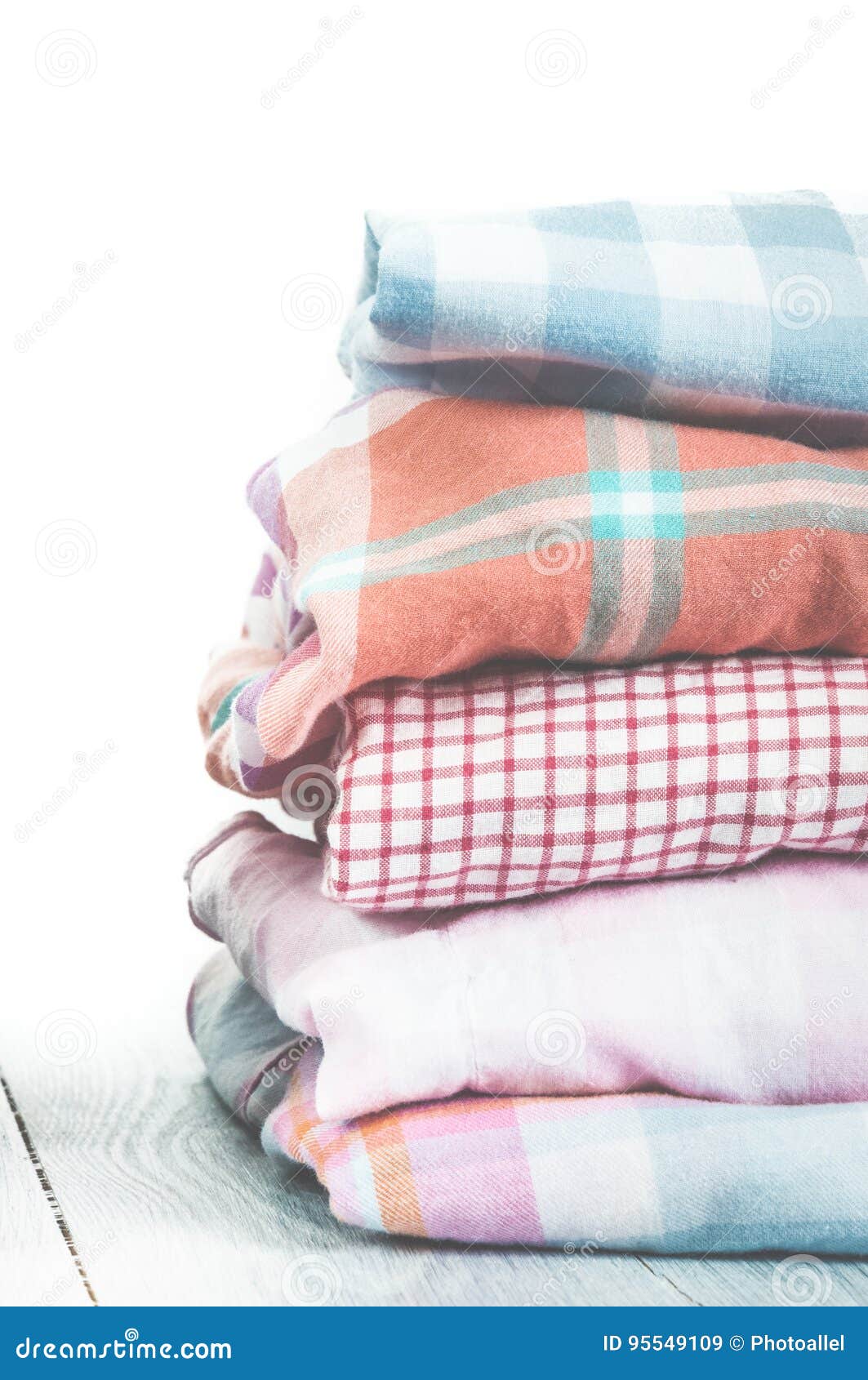 Stacks of Multicolor Clothing on White Background. Spring Concep Stock ...