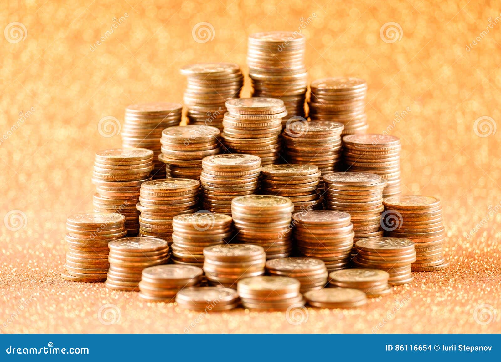 Stacks of old golden coins stock photo. Image of change - 86116654