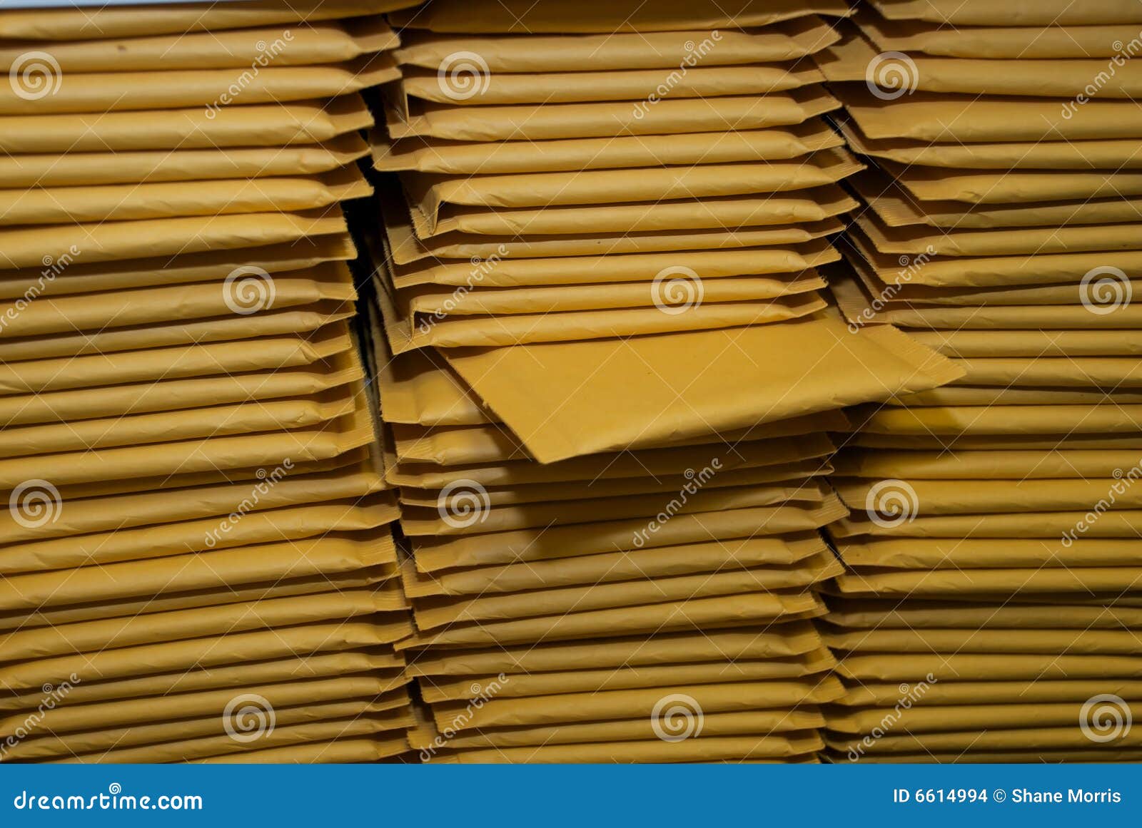 Stacks of Padded Shipping Envelopes Stock Photo - Image of post ...
