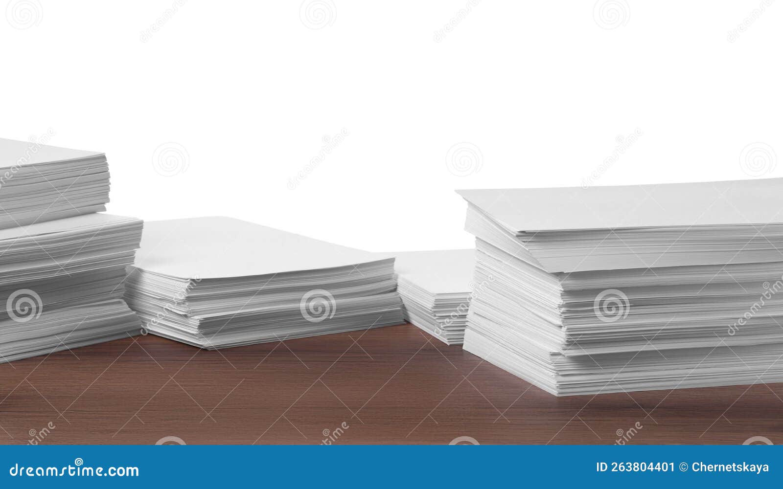 Stacks of Paper Sheets on Wooden Table Against White Background Stock ...