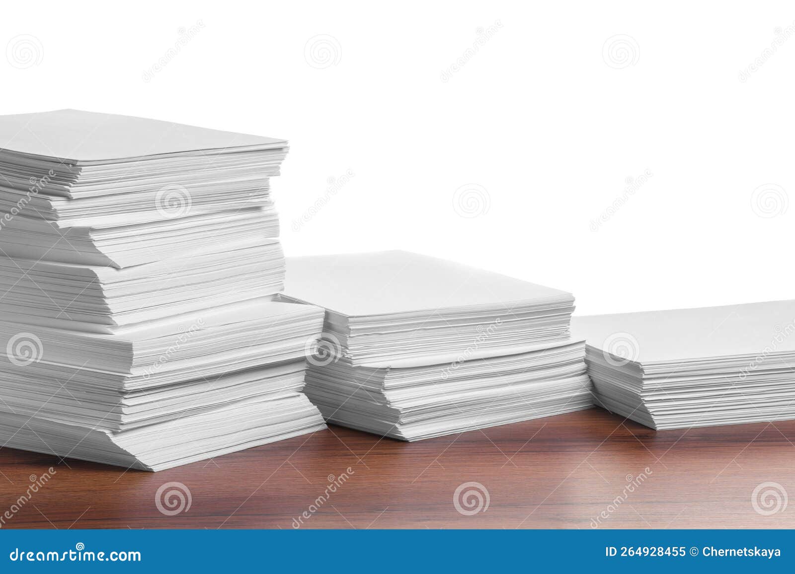 Stacks of Paper Sheets on Wooden Table Against White Background Stock ...