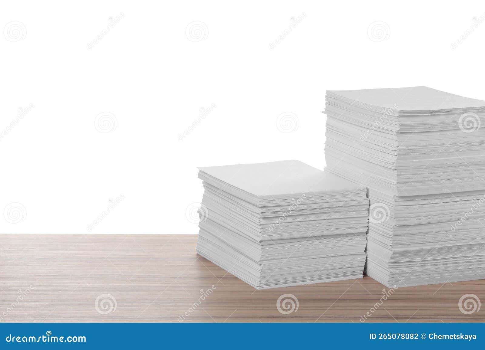 Stacks of Paper Sheets on Wooden Table Against White Background. Space ...