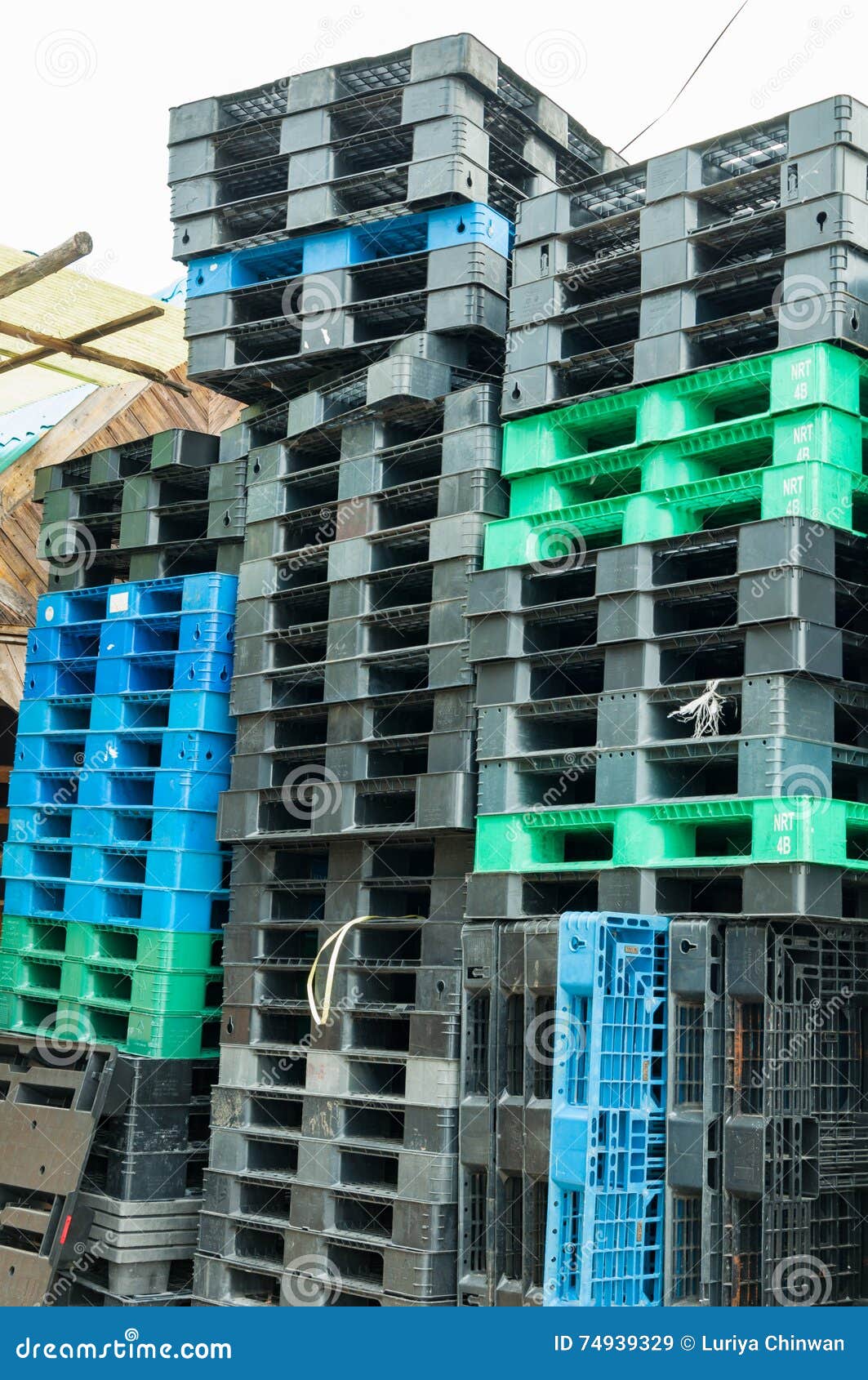 Stacks of plastic pallets stock image. Image of pallet - 74939329