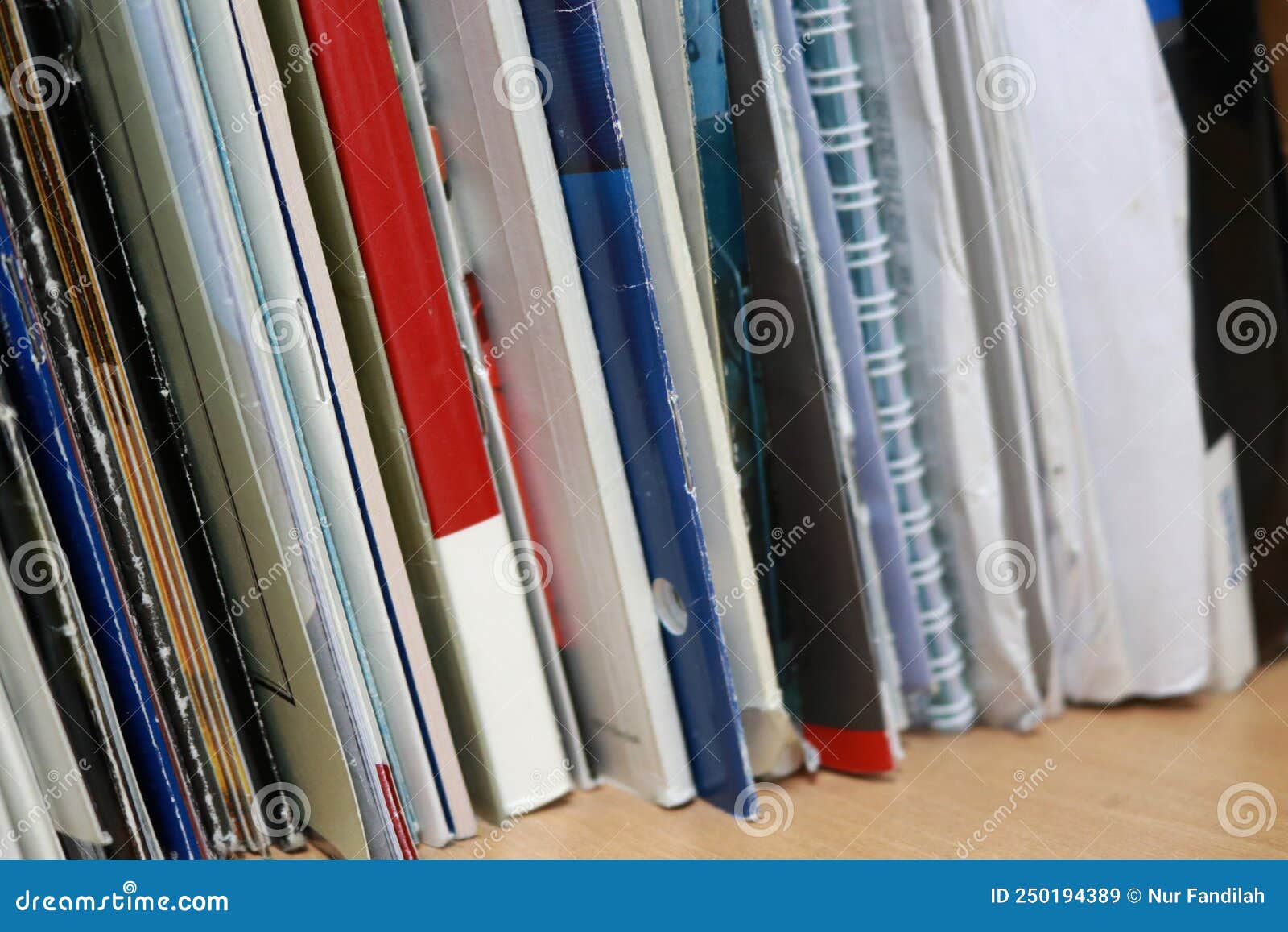 Stacks or Rows of Books, Magazines, Journals and Newspapers in a ...