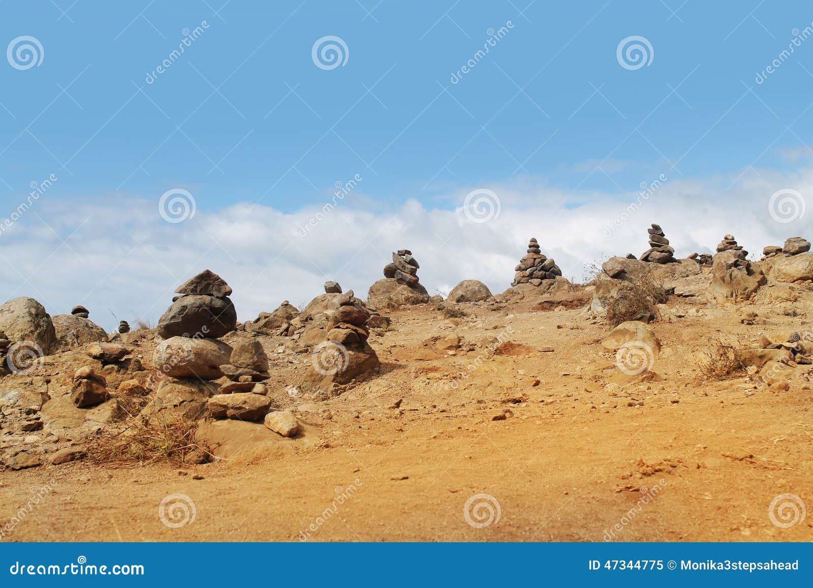 Stacks of Stones on Sand Desert Stock Image - Image of stones, distant ...