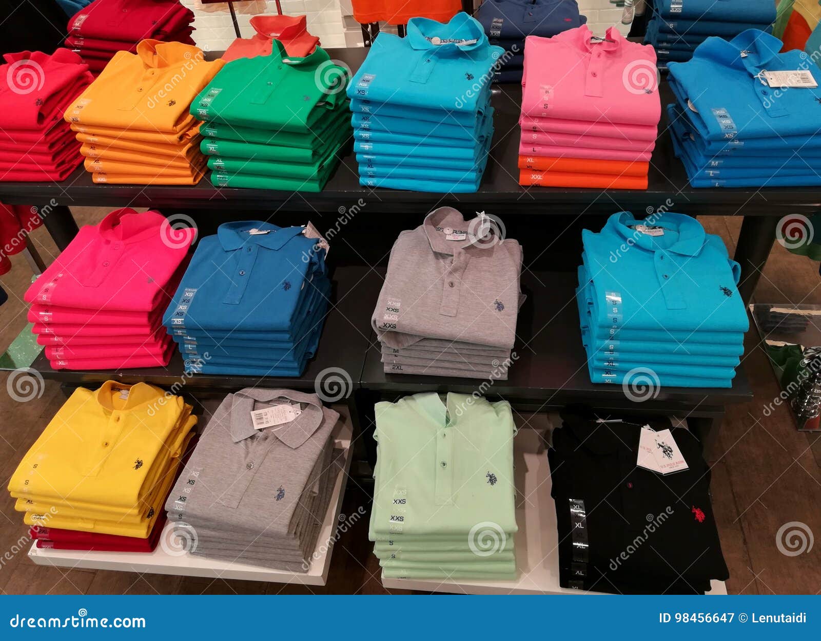 Stacks of t-shirts editorial photography. Image of fiber - 98456647