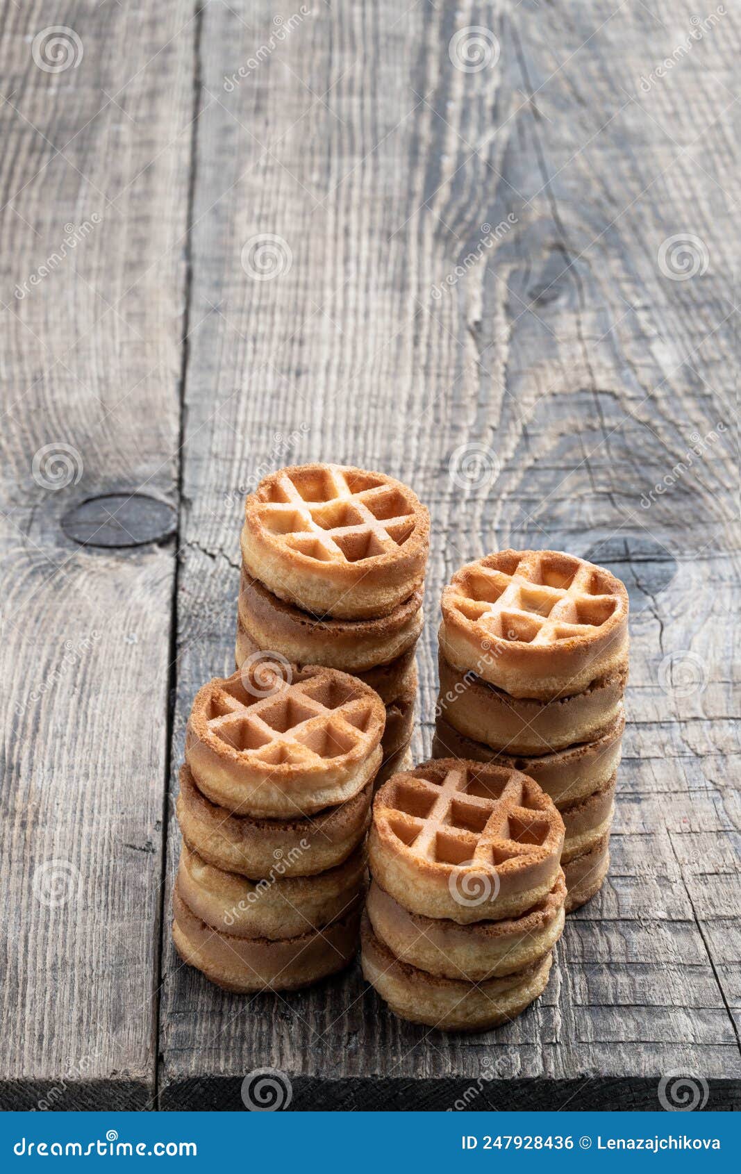 Stacks of Tasty Round Mini Waffles on Wooden Table Stock Photo - Image ...