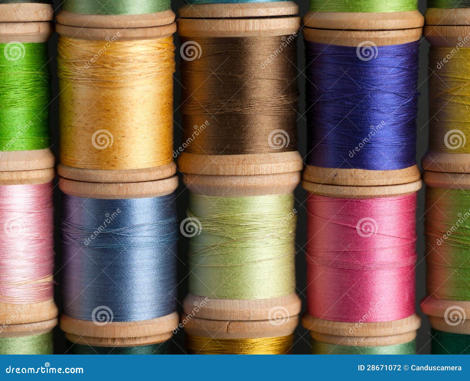 Stacks of Vintage Threads on Wooden Spools Stock Photo - Image of ...
