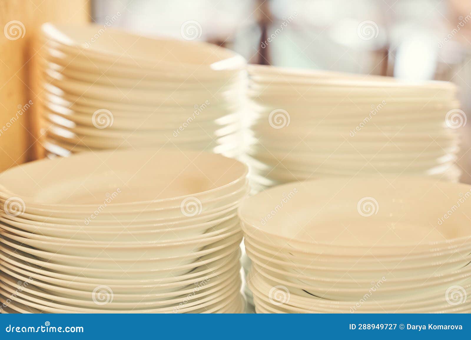 Stacks of White Dishes are Ready at the Hotel. a Set of White Plates on ...