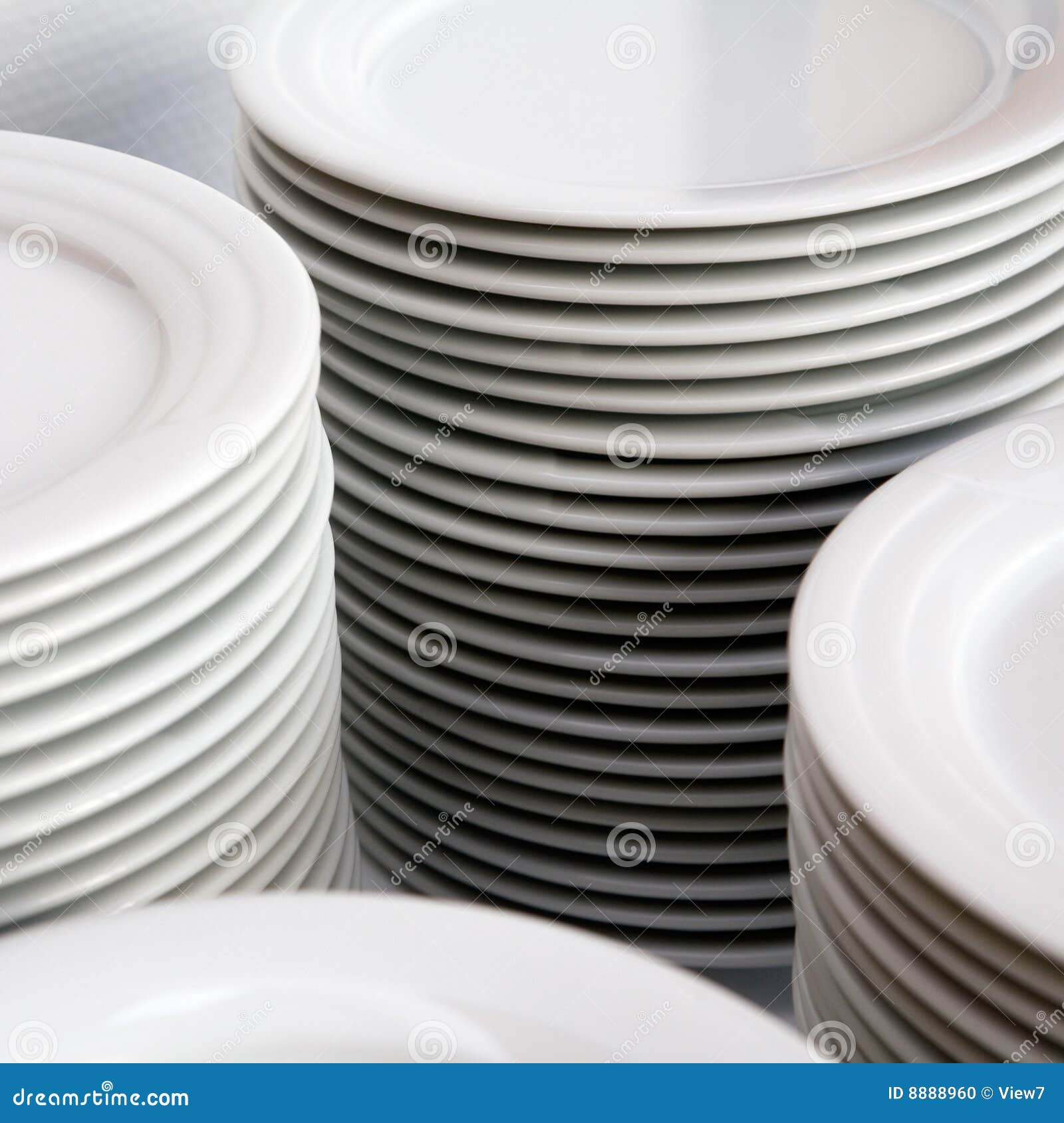 Stacks of white plates stock photo. Image of life, piled - 8888960