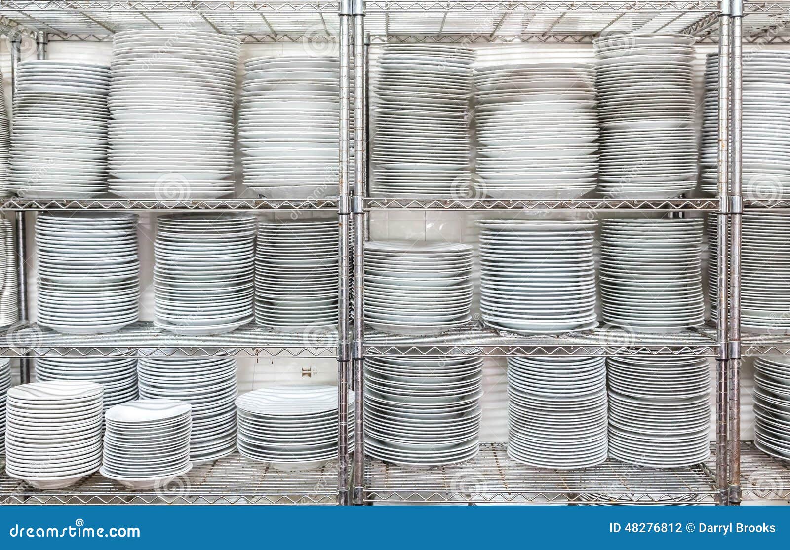 Stacks of White Plates stock photo. Image of dishes, rack - 48276812