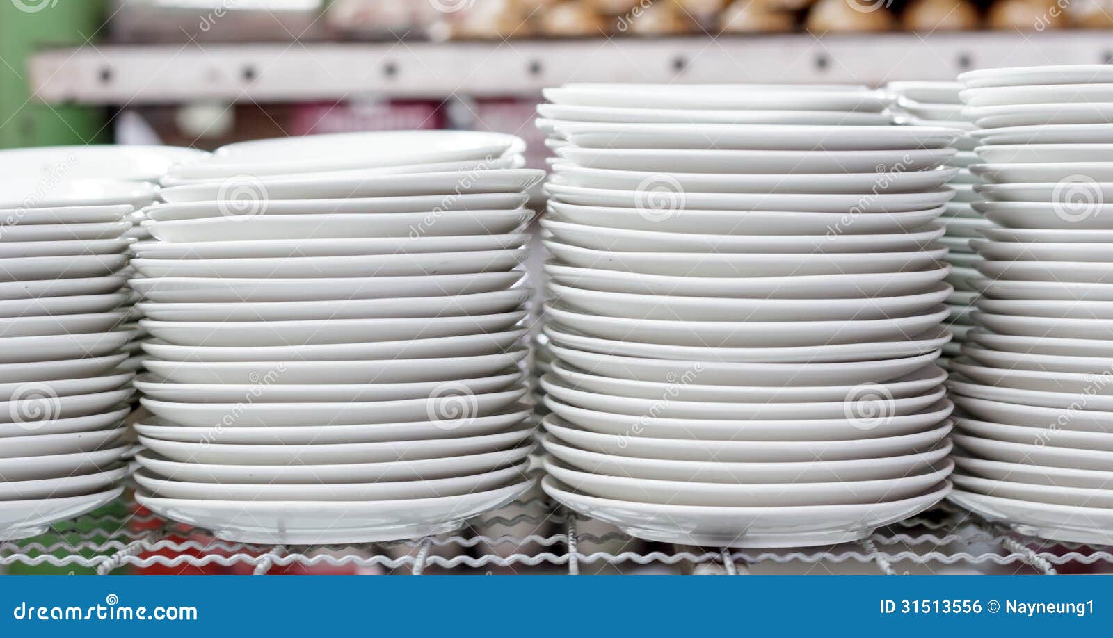 Stacks of white plates stock photo. Image of restaurant - 31513556