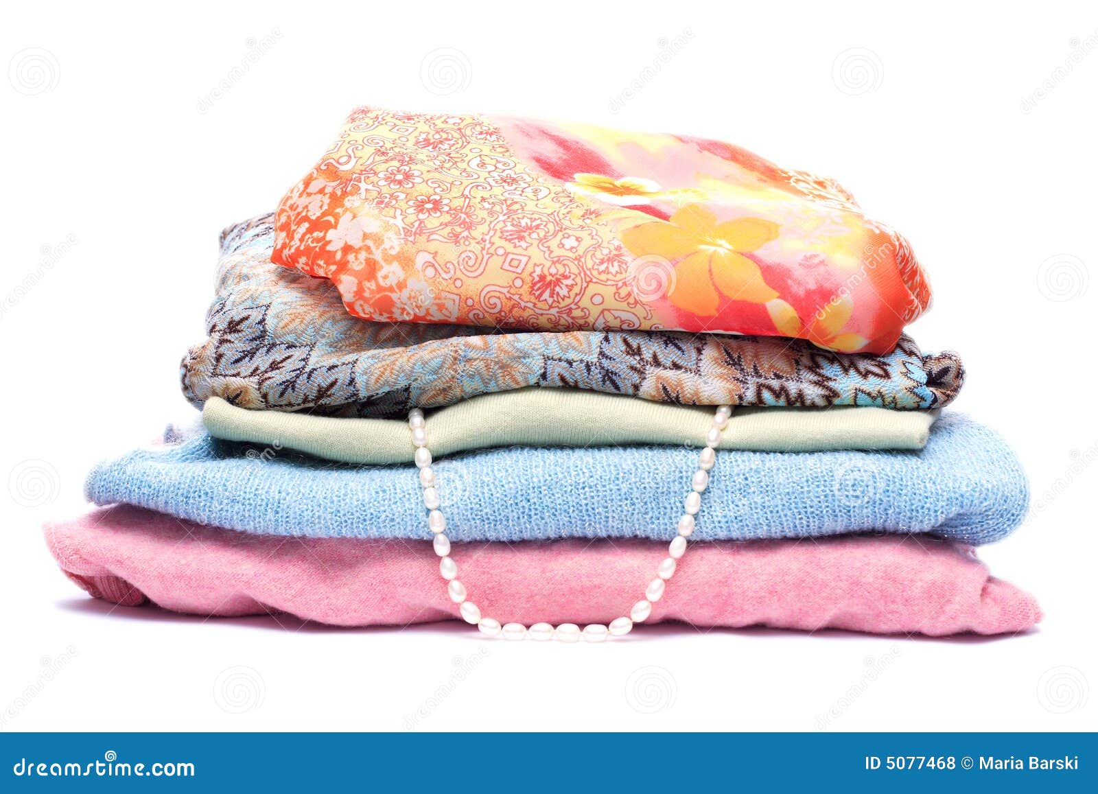 Stacks of Women Colored Clothes Stock Photo - Image of material, green ...