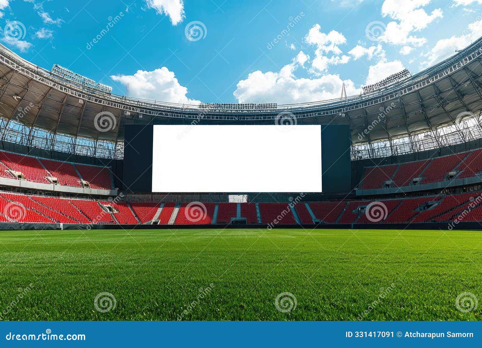 A Stadium with a Large Empty Scoreboard, a Mockup of an Empty White ...