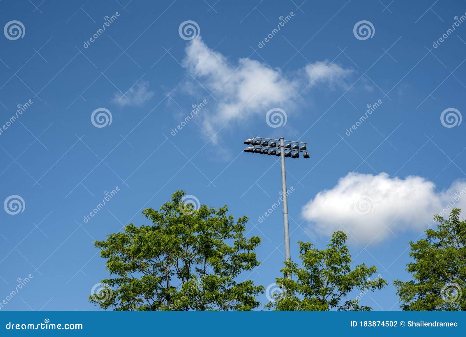 Stadium Lights with Blue Sky Background Stock Photo - Image of line ...