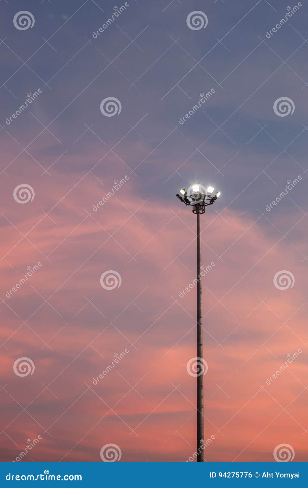 Stadium Lights Turned on and a Beautiful Sunset in the Background Stock ...