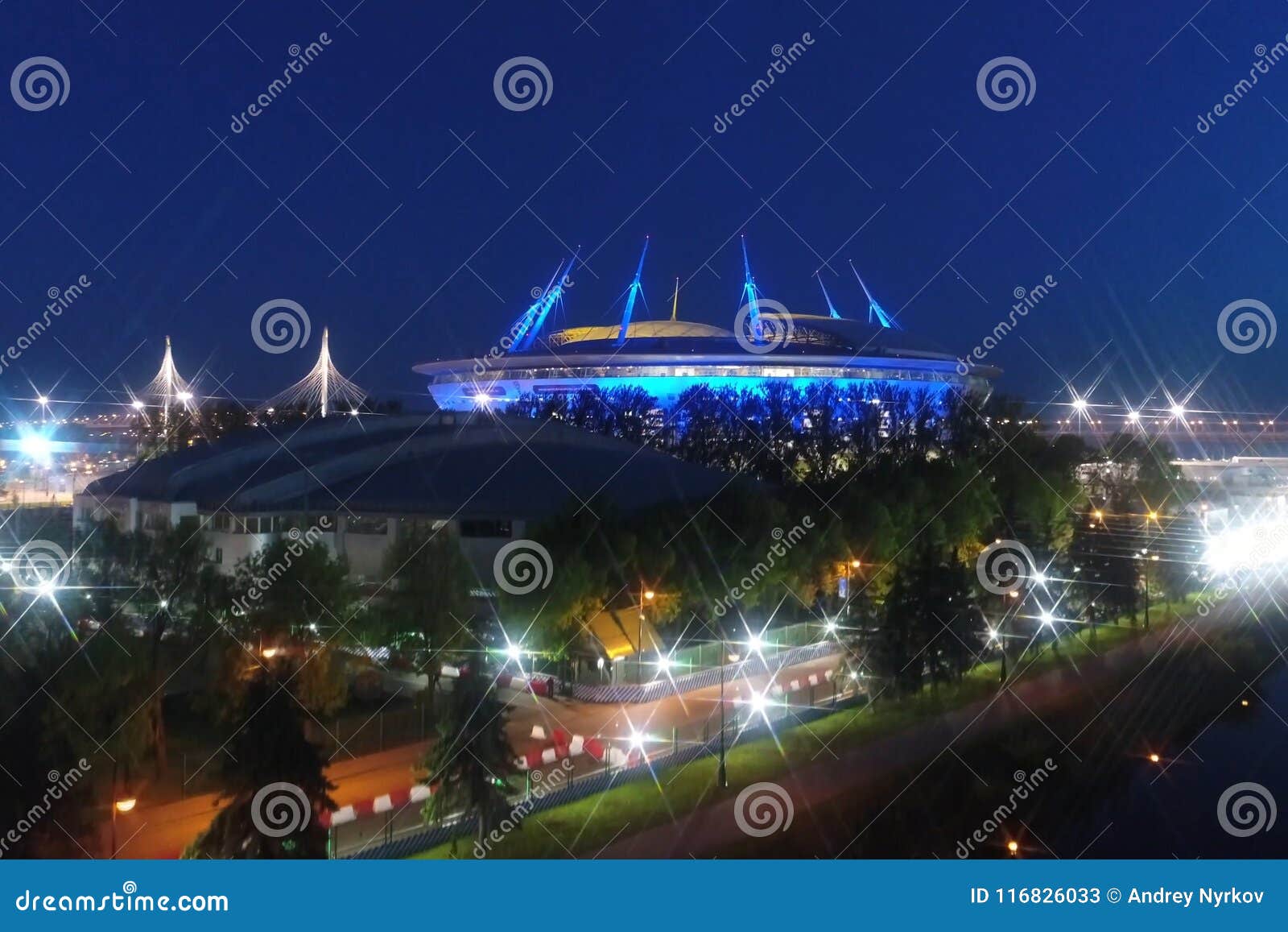 Stadium Zenith Arena at Night. Illuminated by Multi-colored Lights the ...