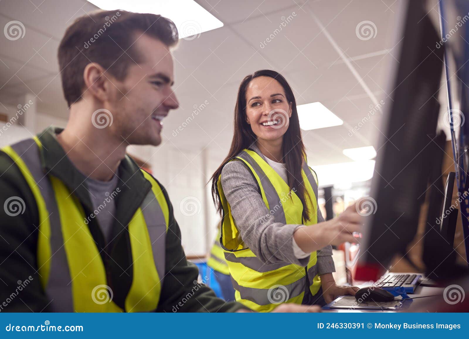 Staff in Busy Modern Warehouse Working on Computer Terminals Stock ...