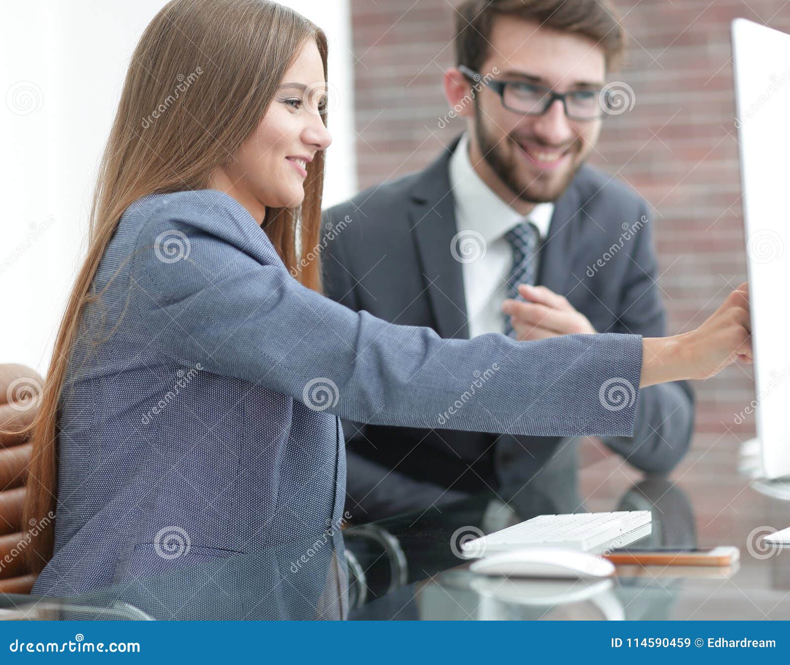 Colleagues Discussing Information on a Computer Stock Image - Image of ...
