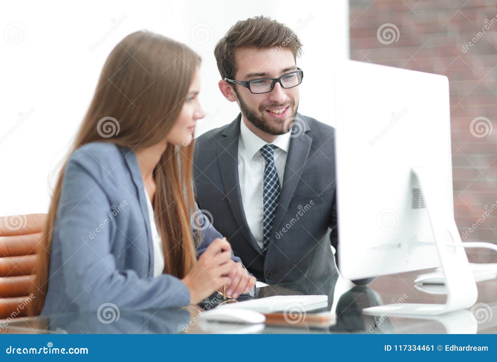 Colleagues Discussing Information on a Computer Stock Image - Image of ...