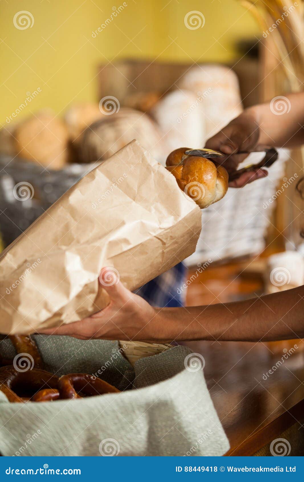 Staff Packing Bread in Paper Bag at Bakery Shop Stock Photo - Image of ...