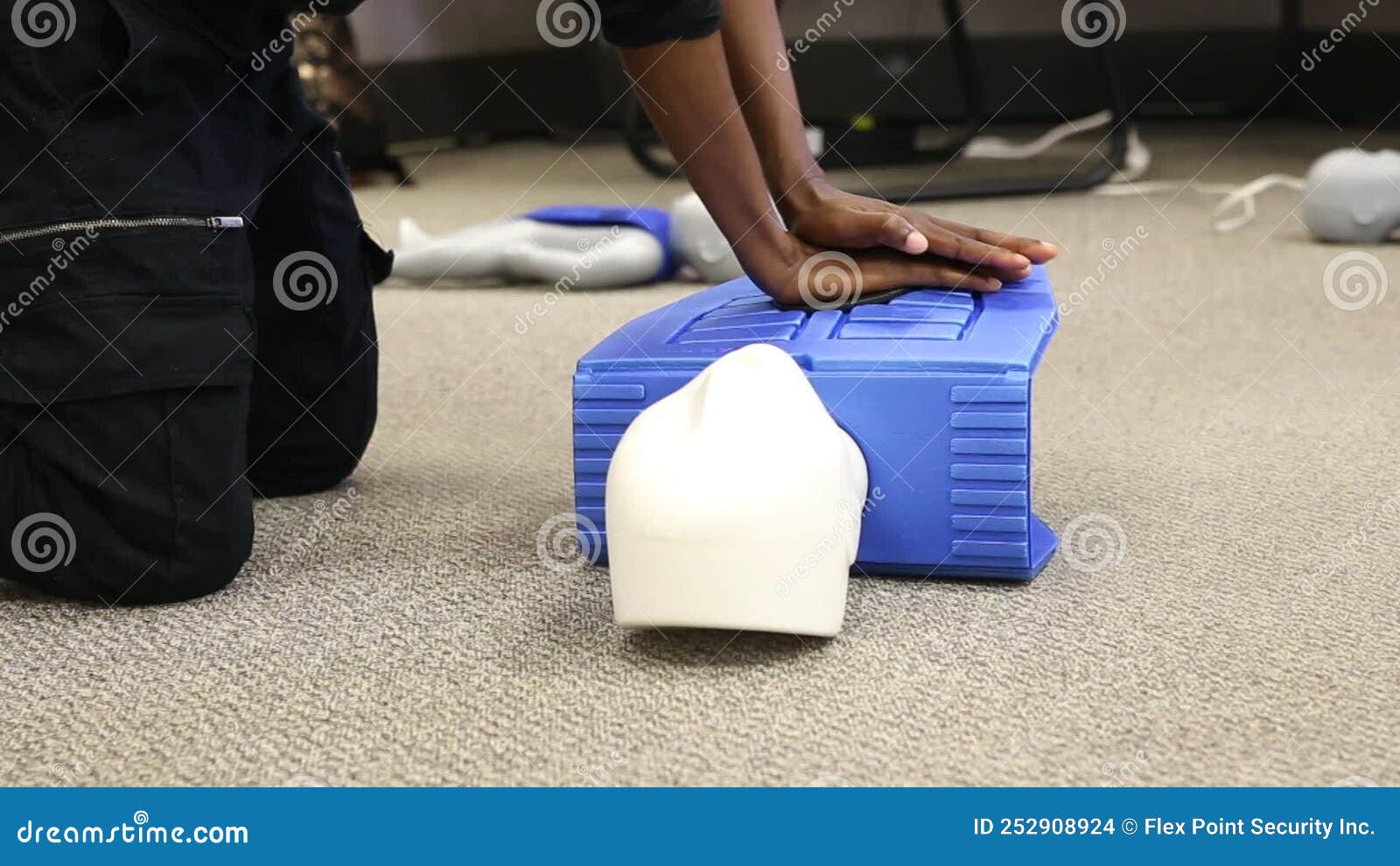 Staff Practicing First Aid Cpr with AED Machine and Dummy Dolls Stock ...