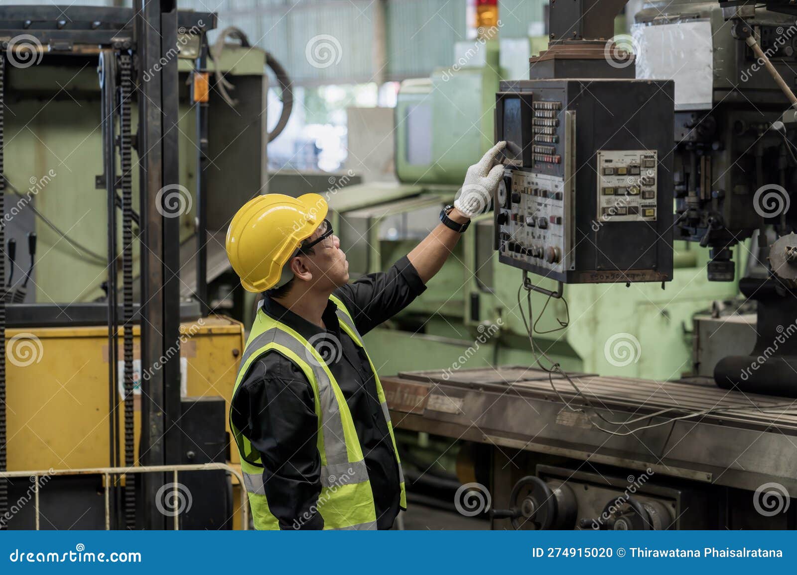 Staff or Technicians are Checking the Operation of the Old Machine ...