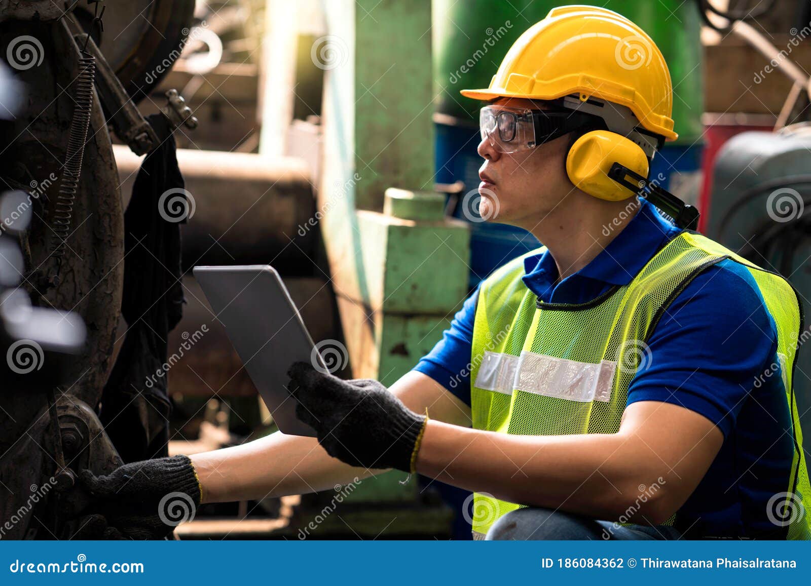 Staff or Technicians are Checking the Operation of the Old Machine Via ...