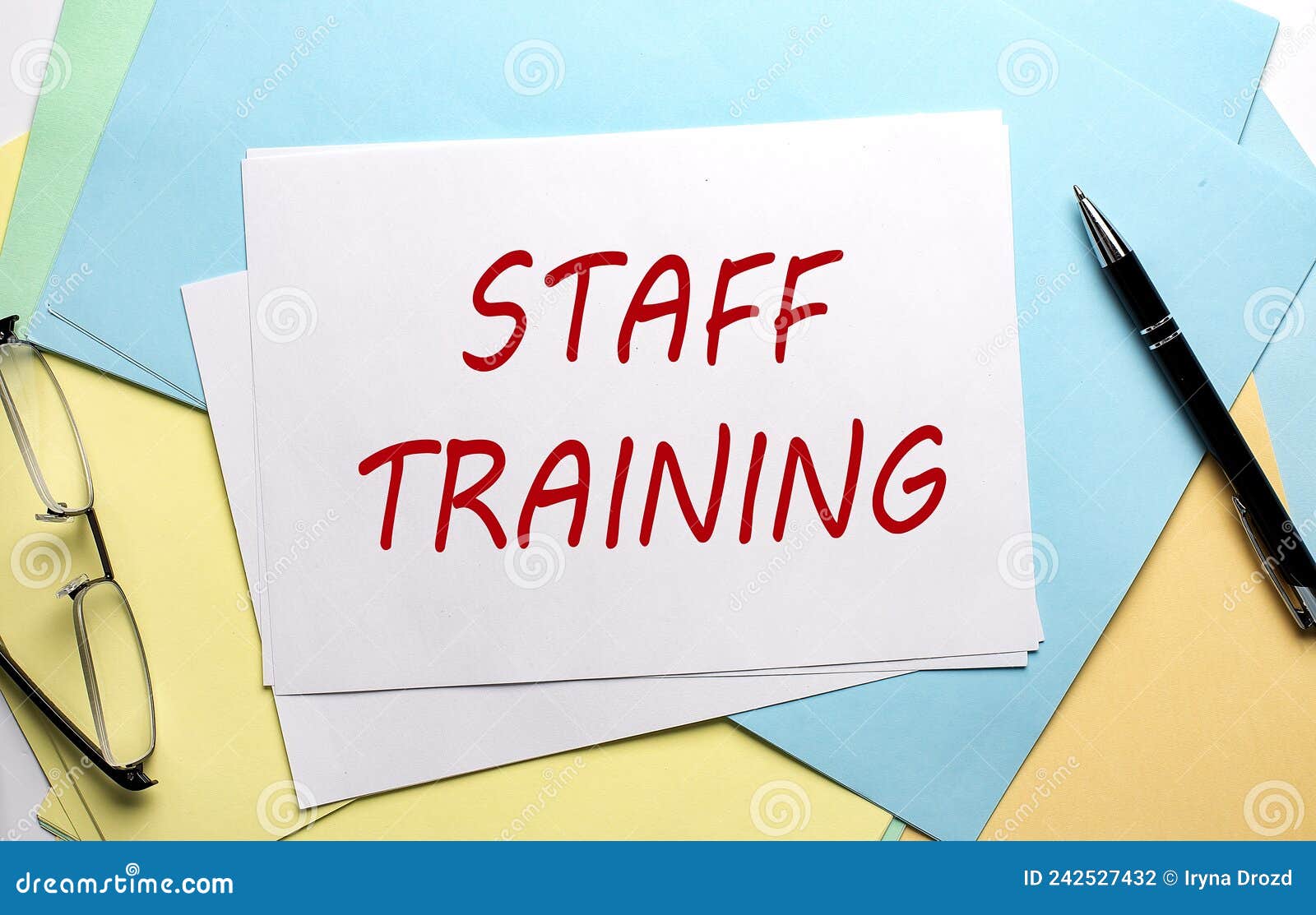 STAFF TRAINING Text on Paper on the Colorful Paper Background Stock ...