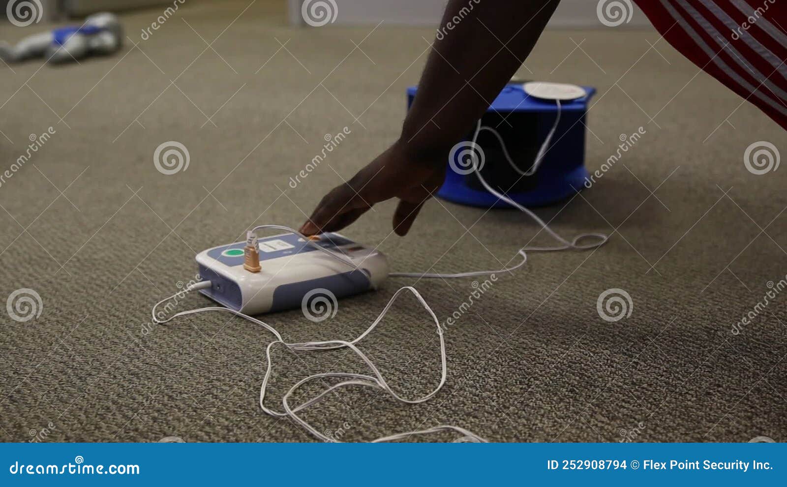 Staff Practicing First Aid Cpr with AED Machine and Dummy Dolls Stock ...