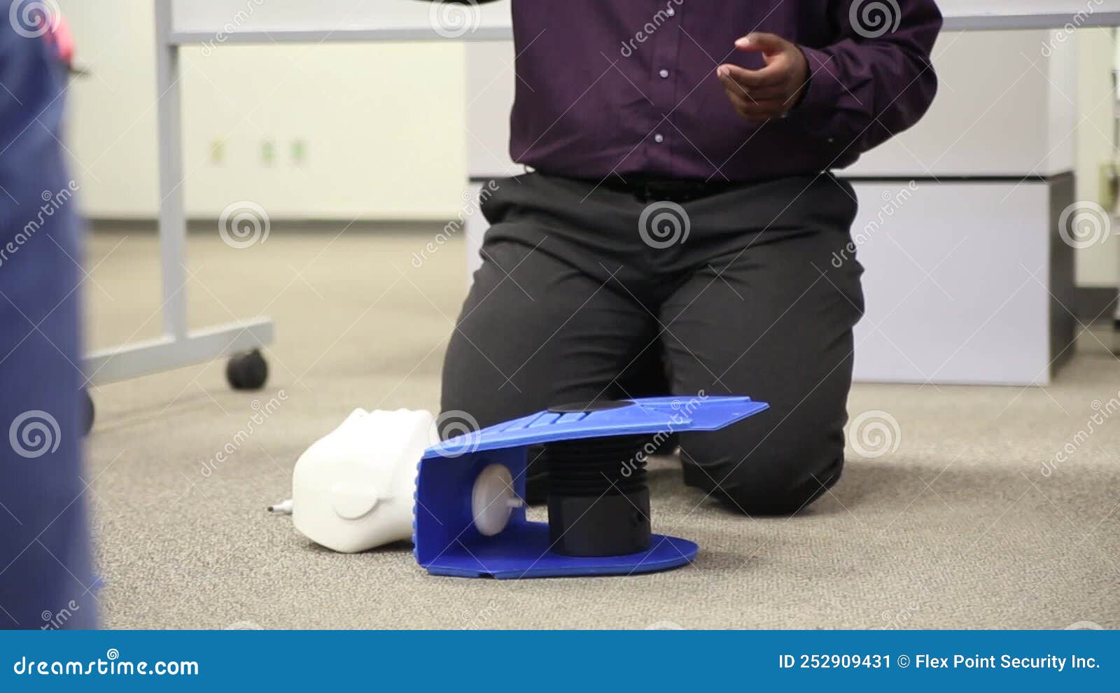 Staff Practicing First Aid Cpr with AED Machine and Dummy Dolls Stock ...