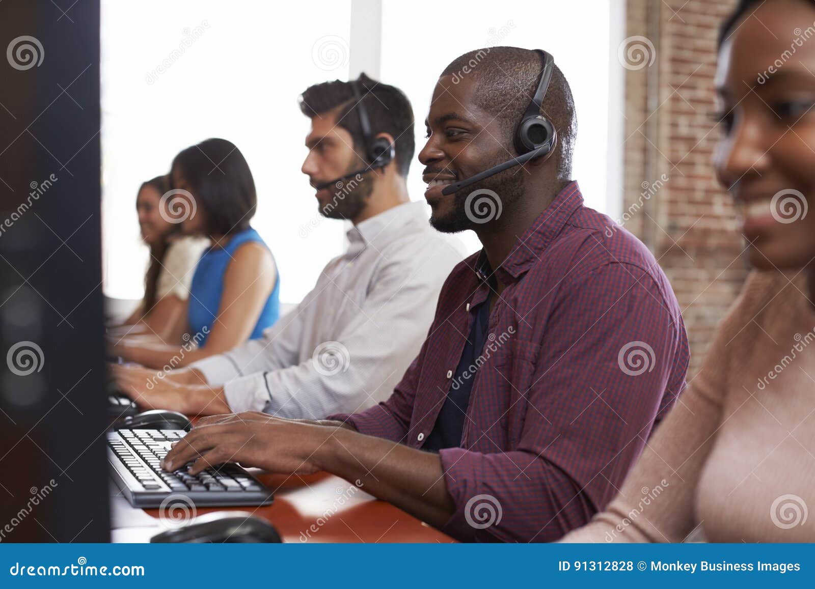 Staff Working in Busy Customer Service Department Shot Stock Photo ...