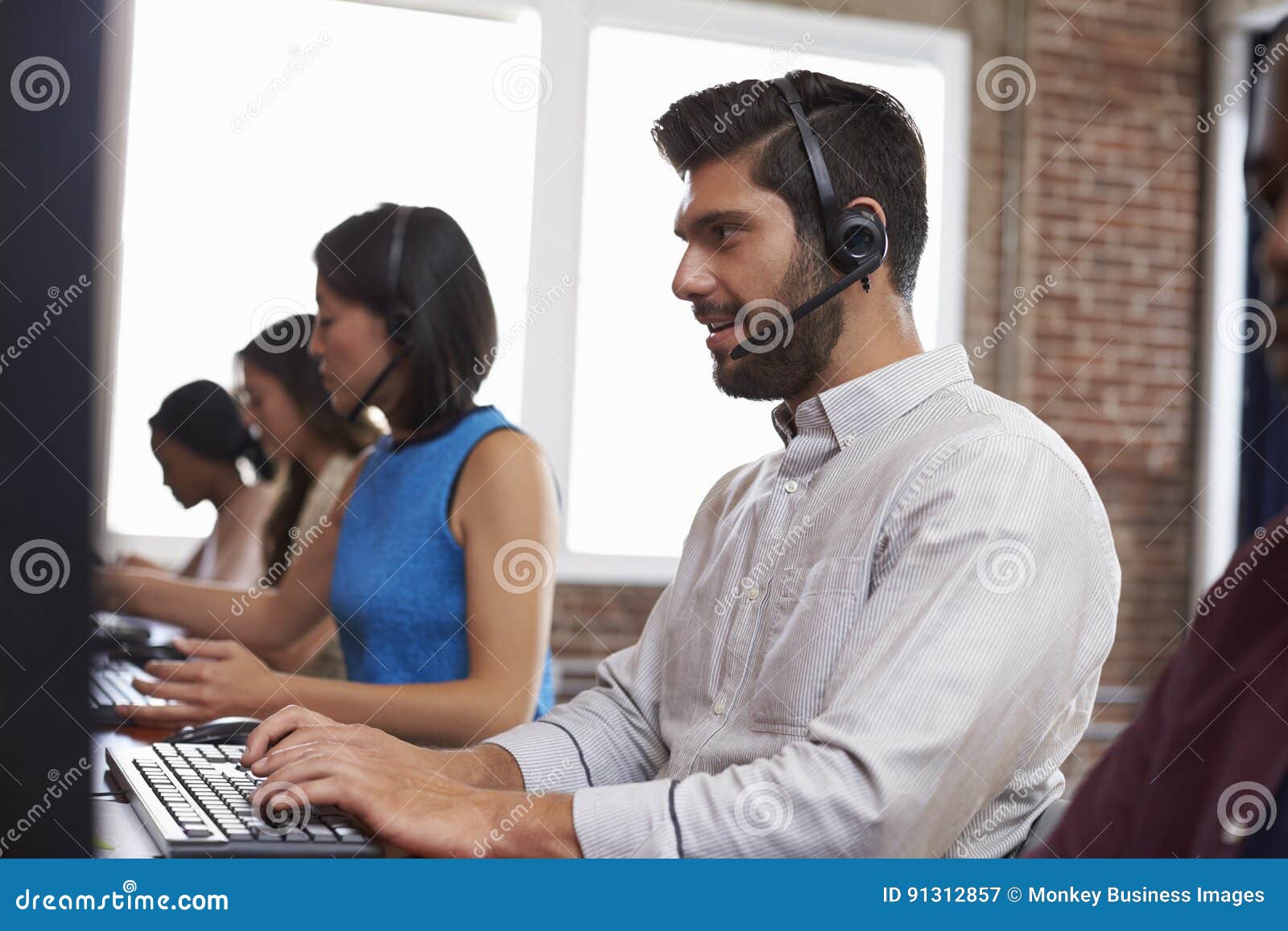 Staff Working in Busy Customer Service Department Shot Stock Image ...