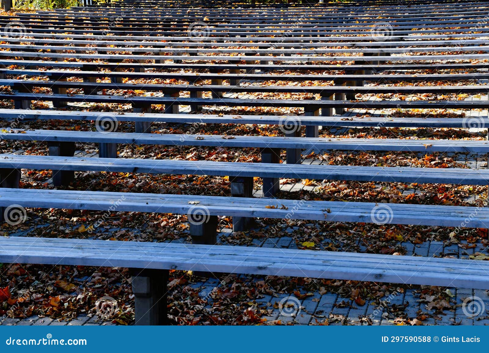 Stage Benches in an Autumn Mood. Stock Photo - Image of blue, leaves ...