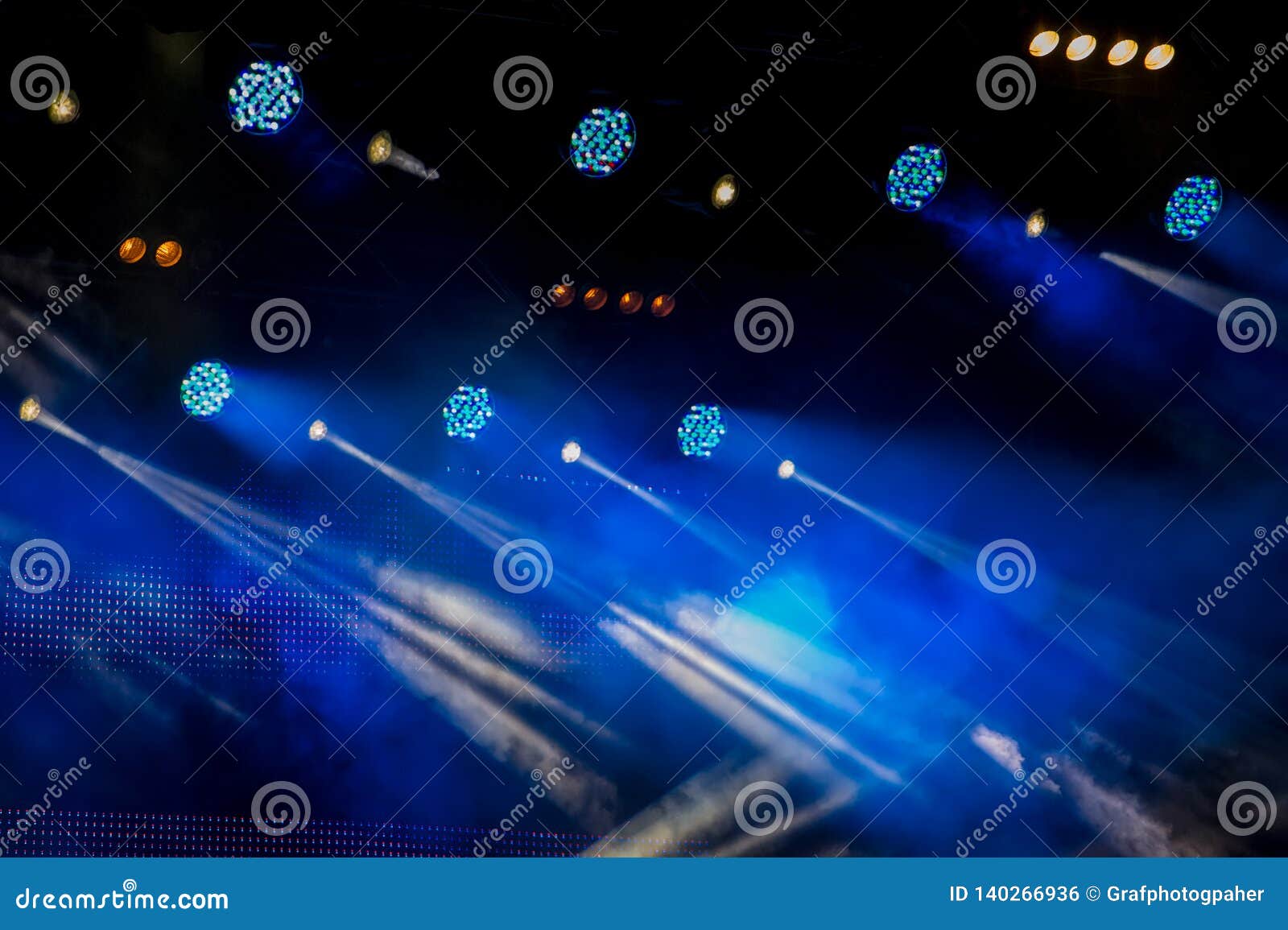 Stage Lighting during a Show on a Dark Background during a Concert ...