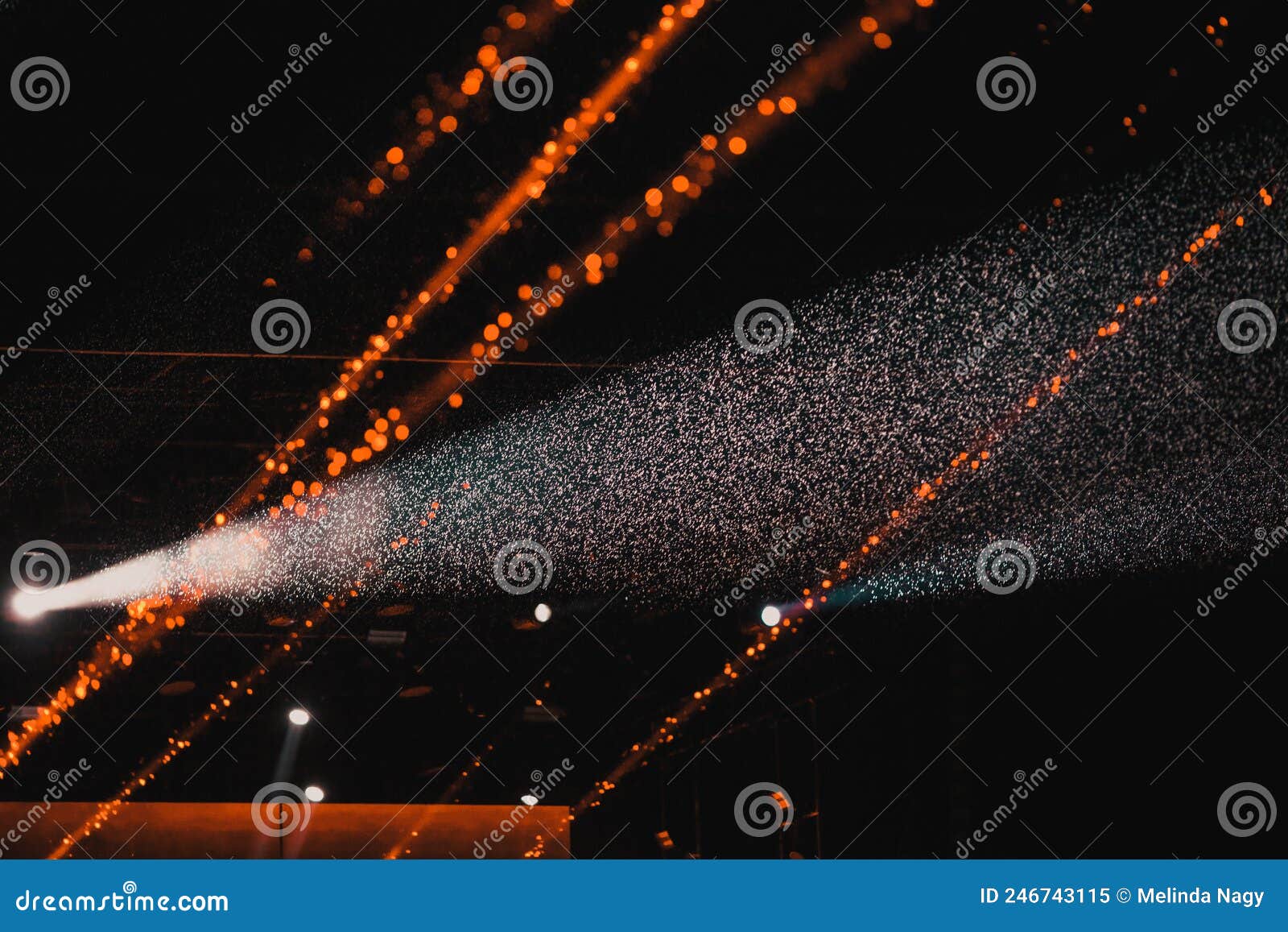 Stage lights in the rain stock image. Image of dark - 246743115