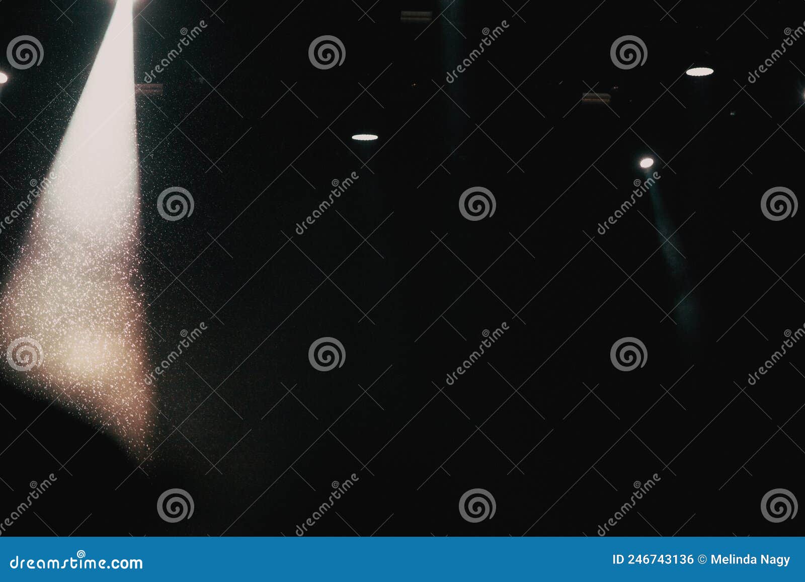 Stage lights in the rain stock photo. Image of bright - 246743136
