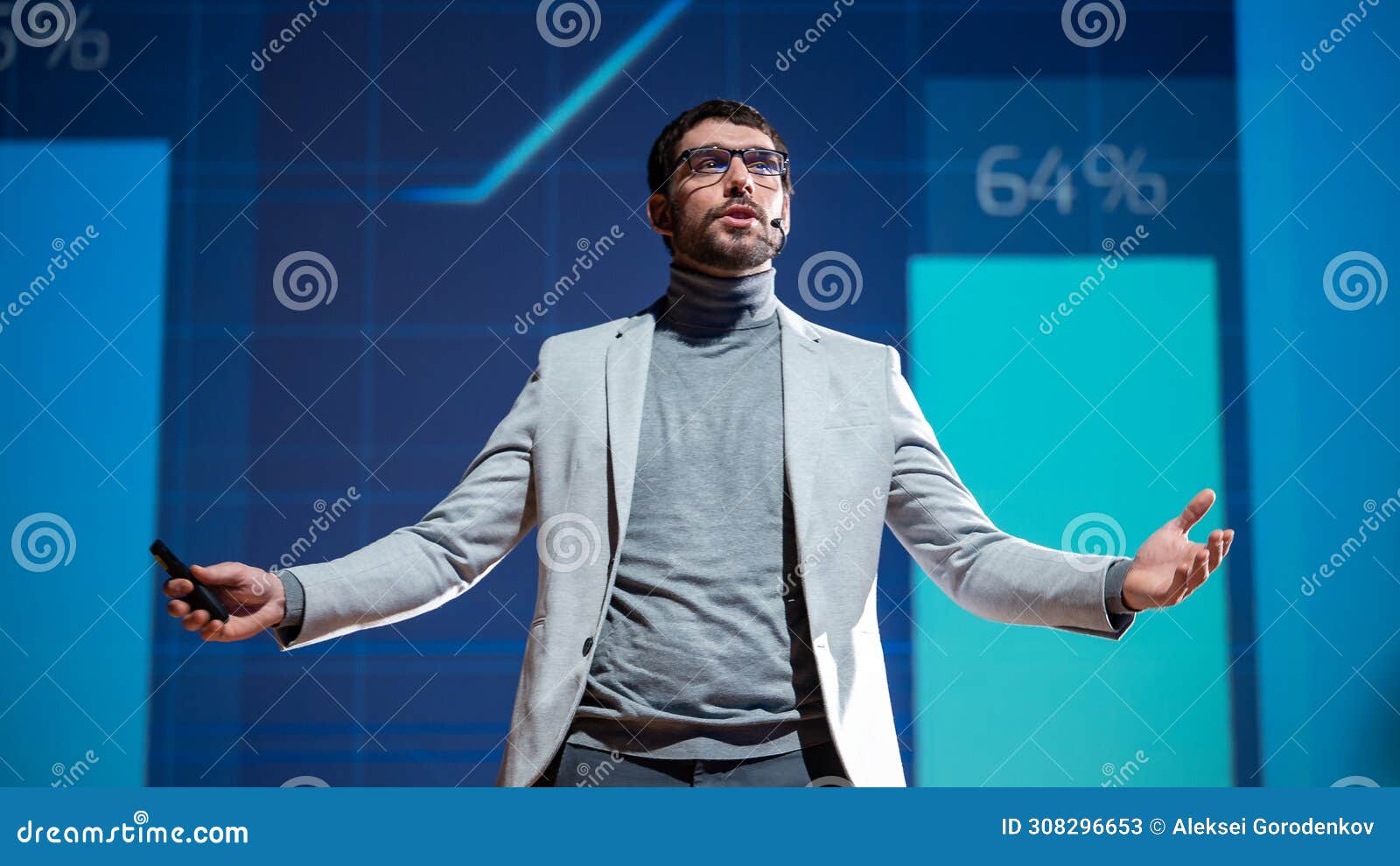 On-Stage Speaker Greets Audience, Presentation of Technological Device ...